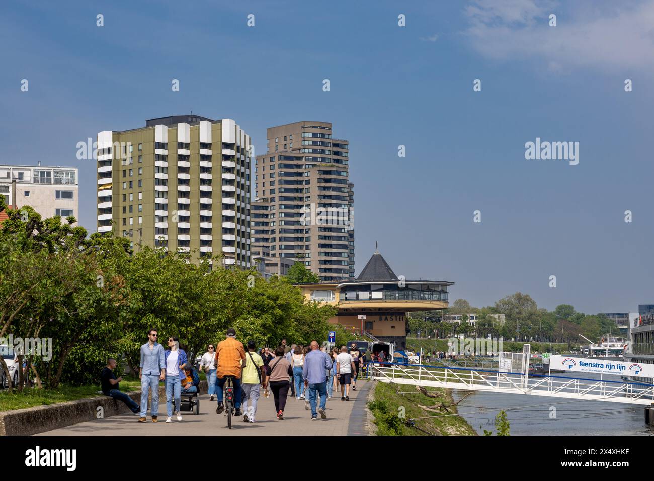 People enjoying warm spring weather on Rhine Promenade in Cologne Stock ...