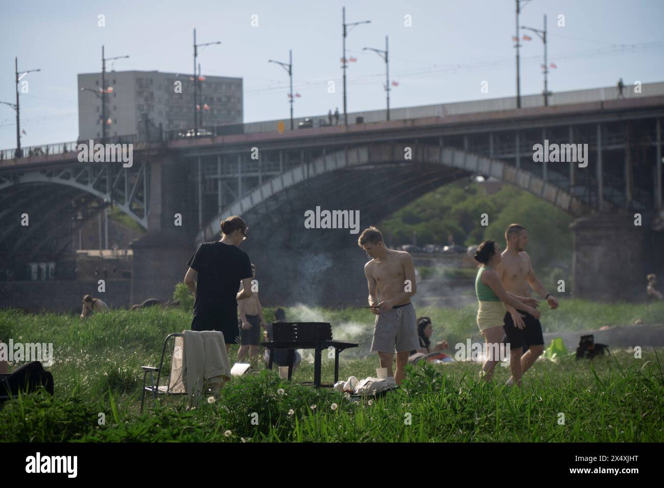 Warsaw, Poland. 05th May, 2024. Young people are seen barbequeing and ...