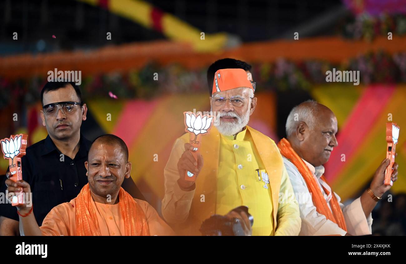 LUCKNOW, INDIA - MAY 5: Prime Minister Narendra Modi during the road show in Ayodhya in a ...