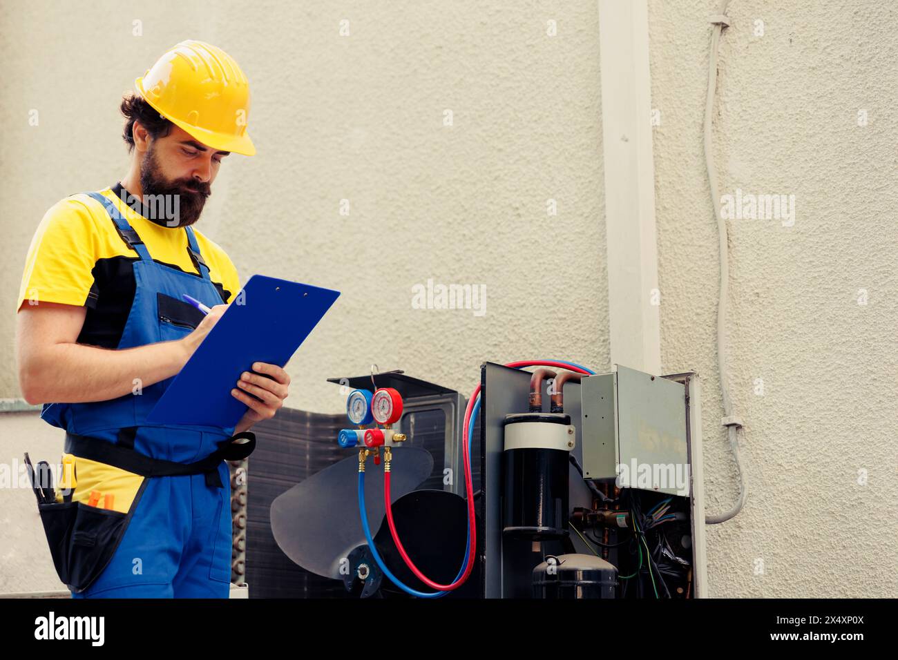 Technician commissioned for external air conditioner routine ...