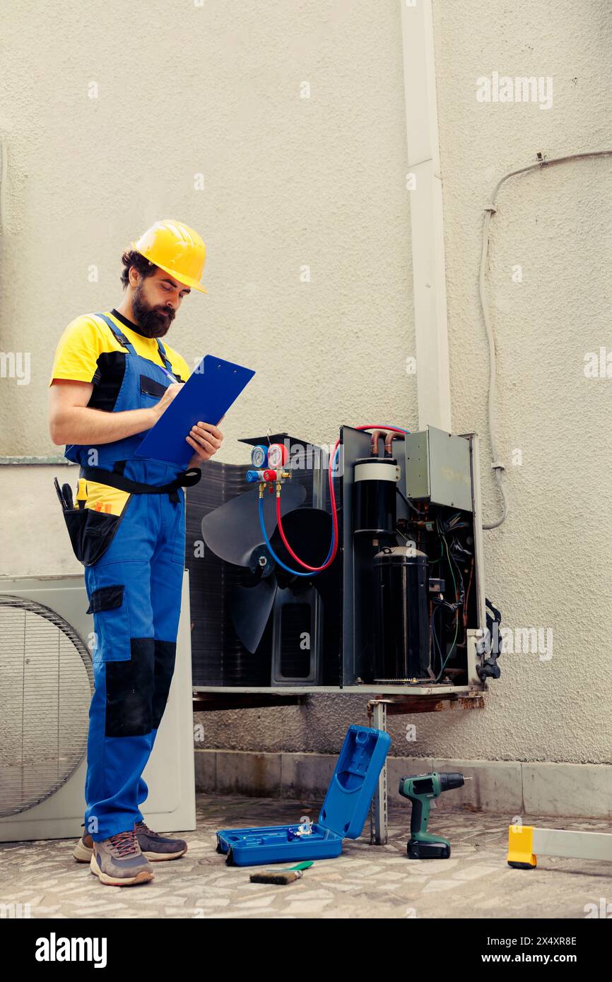 Competent wireman commissioned for outdoor hvac system routine check up ...