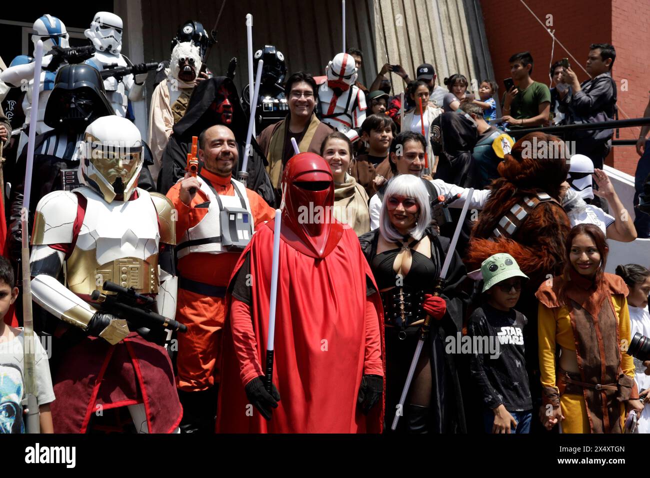 Star Wars Fans disguised as Star Wars characters pose during the Reto ...