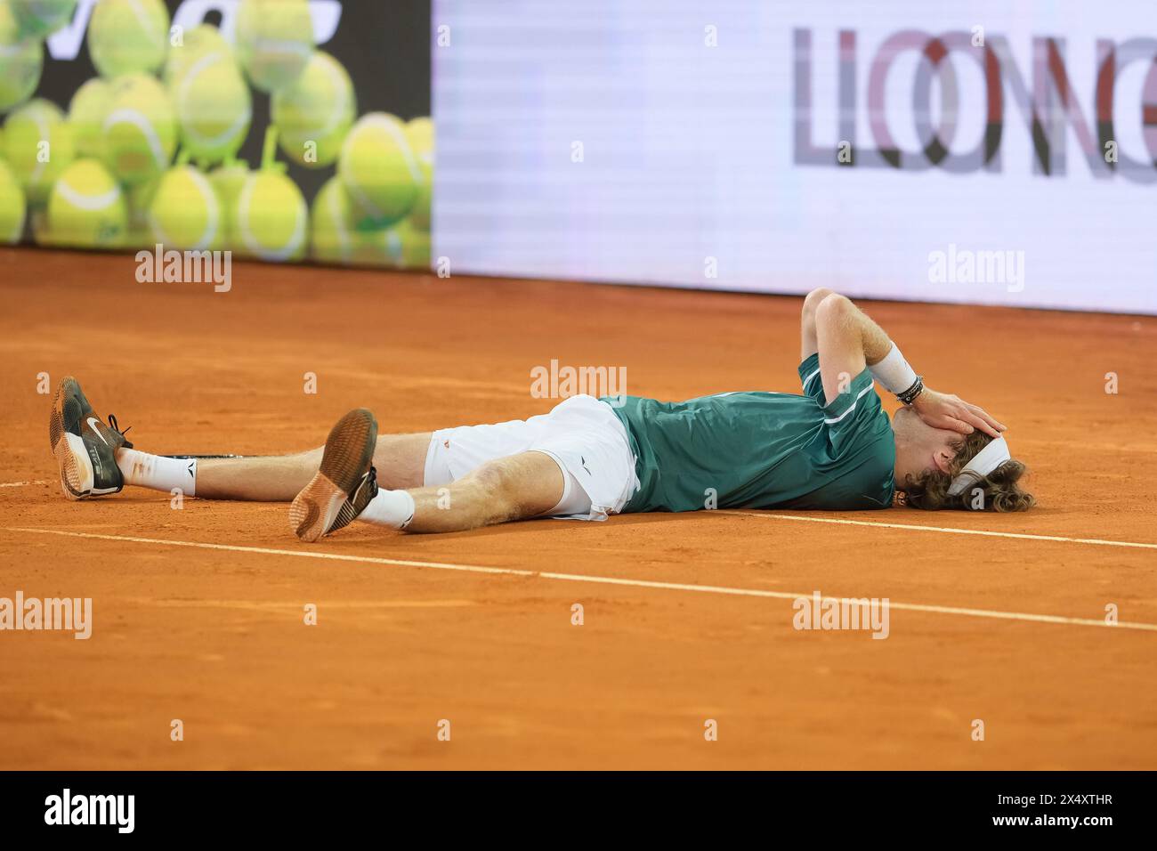 Andrey Rublev poses with the Mutua Madrid Open trophy following victory in the Men's Singles ...