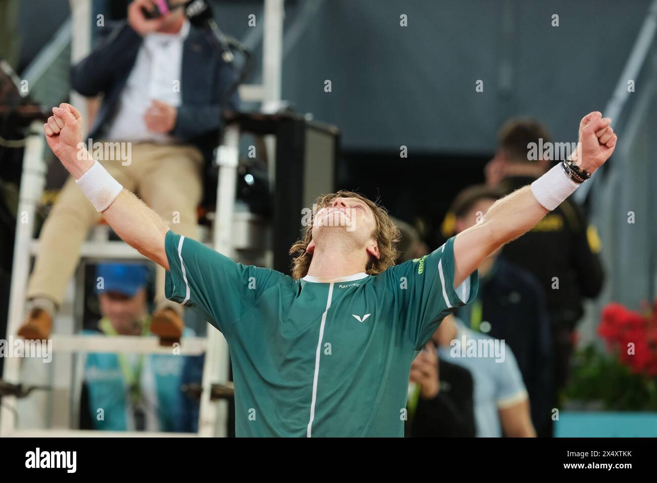 Andrey Rublev poses with the Mutua Madrid Open trophy following victory ...