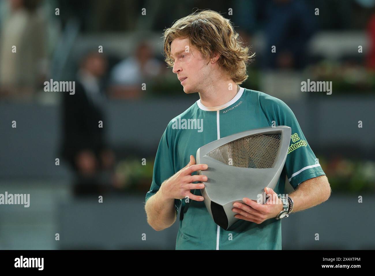 Andrey Rublev poses with the Mutua Madrid Open trophy following victory in the Men's Singles ...