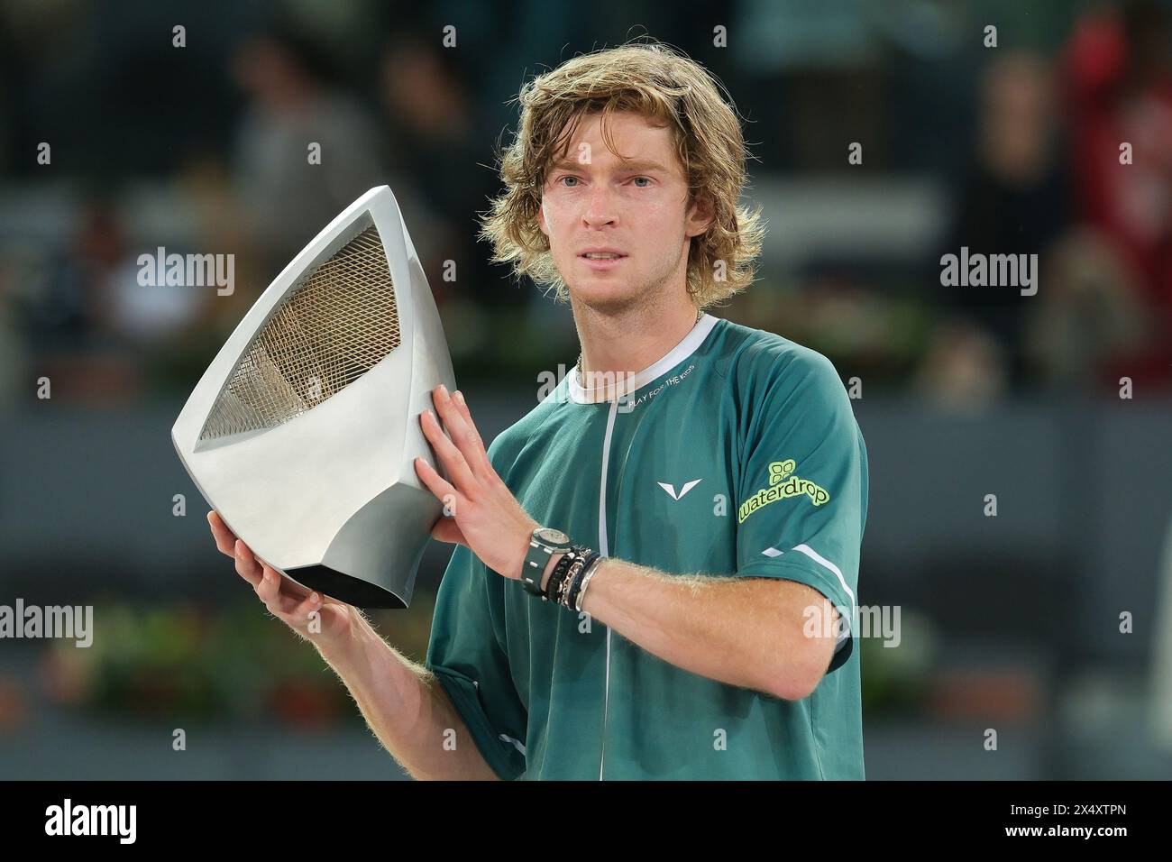 Andrey Rublev poses with the Mutua Madrid Open trophy following victory in the Men's Singles ...
