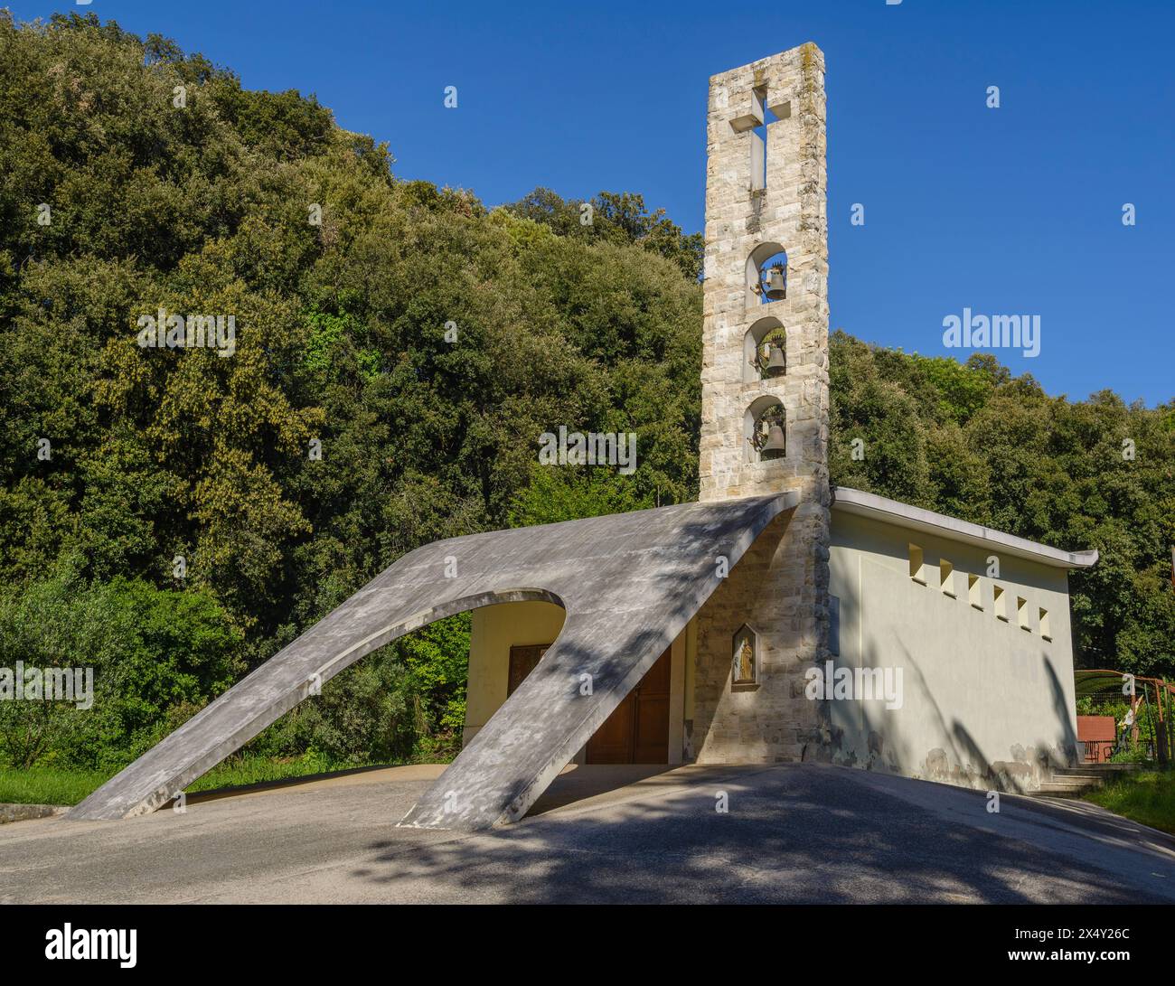 Modern church, unique architectural design with a bell tower, nestled ...