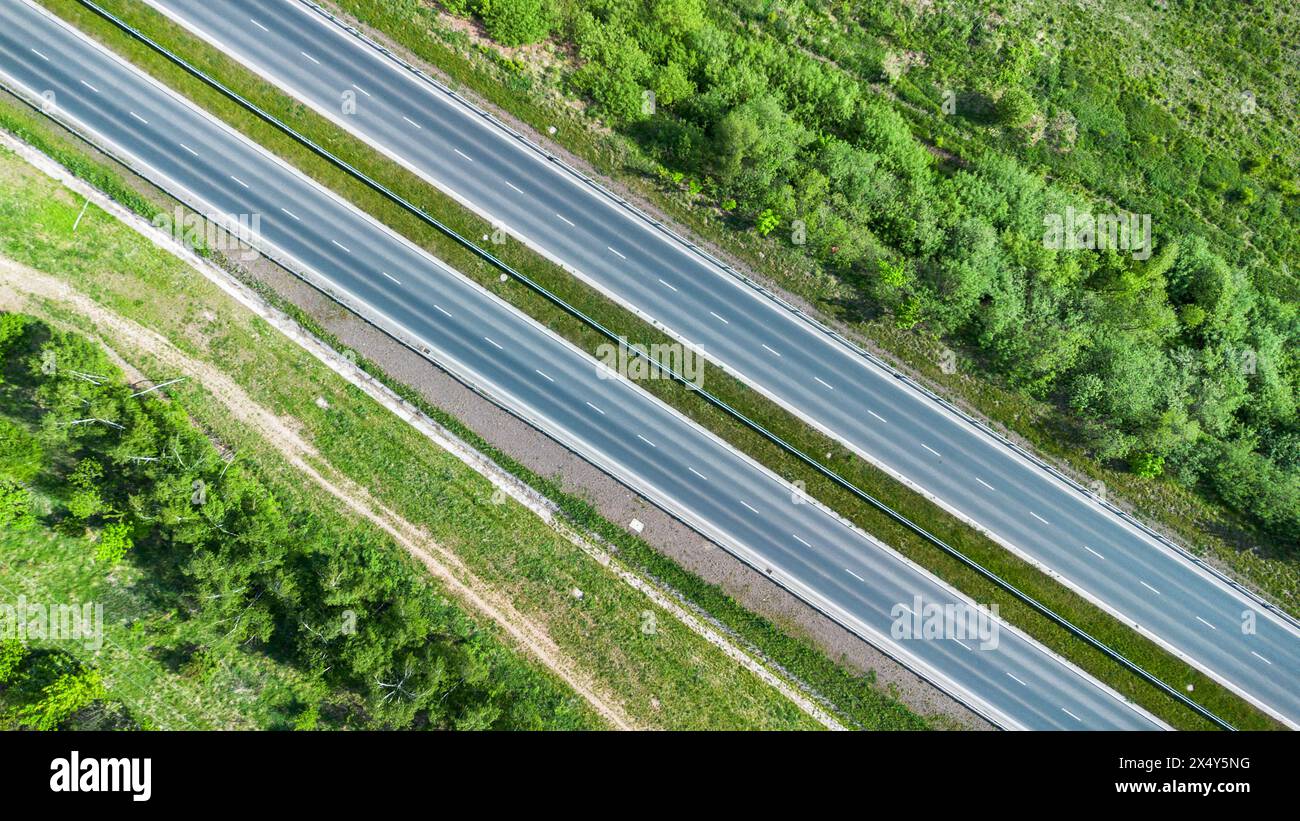 Road cutting through mountain hi-res stock photography and images - Alamy