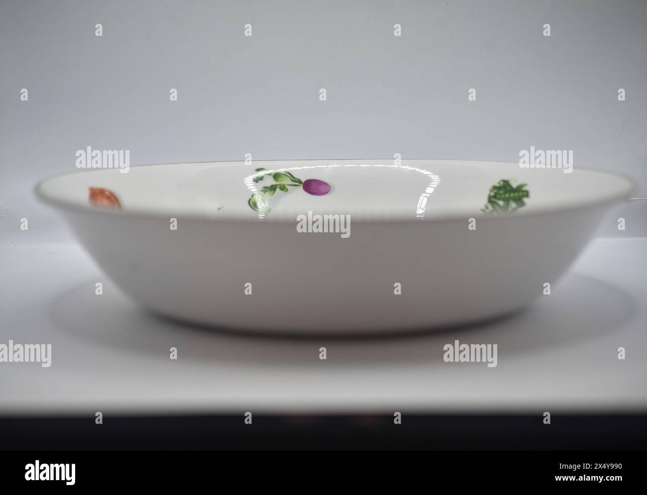 retro serving bowl with vegetable design on inside Stock Photo - Alamy