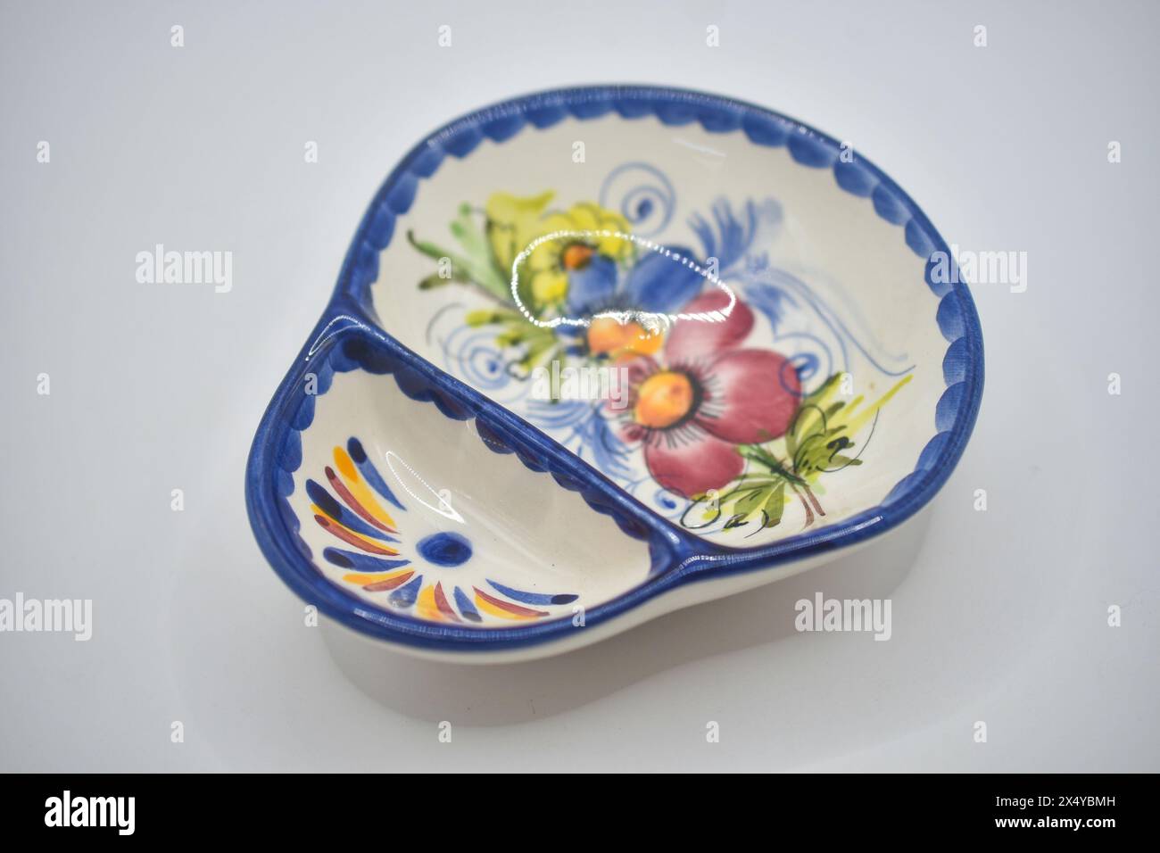 unique porcelain bowl with vibrant floral pattern Stock Photo - Alamy