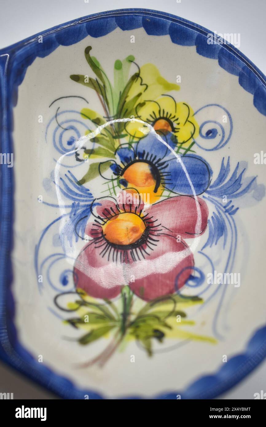 unique porcelain bowl with vibrant floral pattern Stock Photo - Alamy