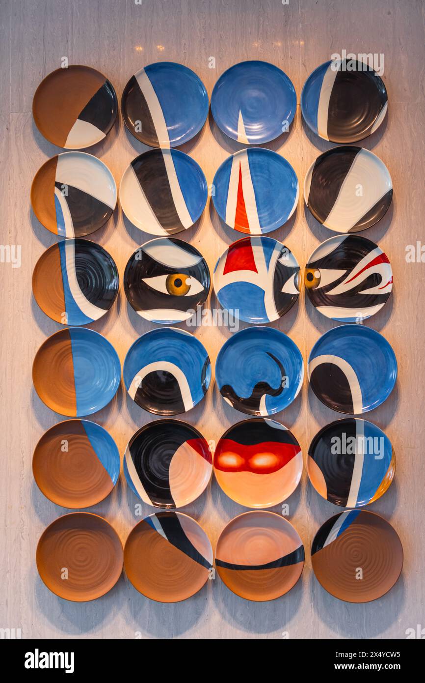 The Sichuan opera mask made out of colorful plates in Chongqing, China ...