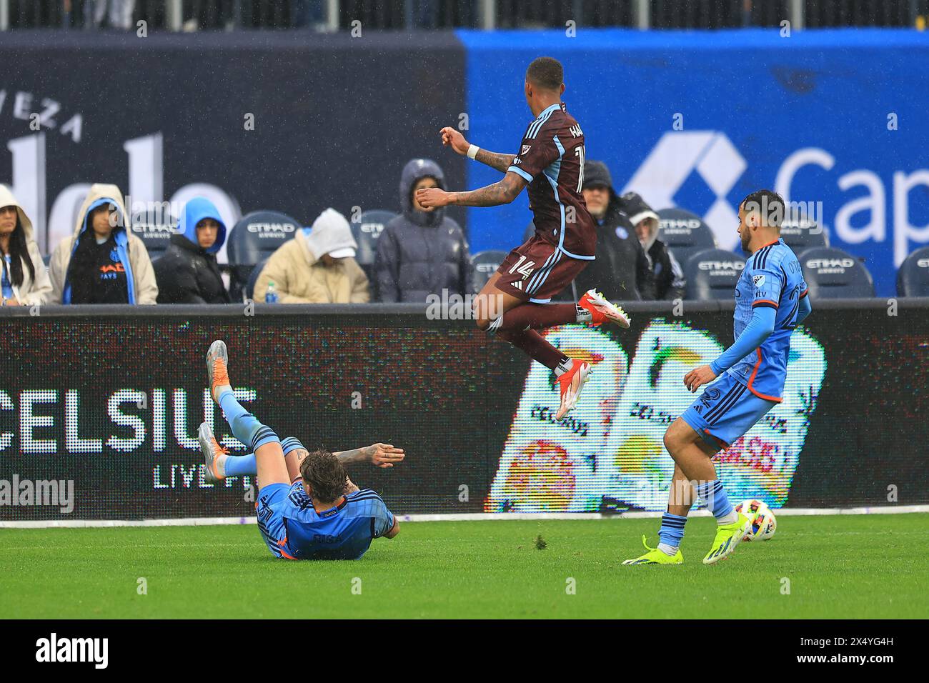 Colorado Rapids FC forward Calvin Harris #14 leaps high to avoid ...