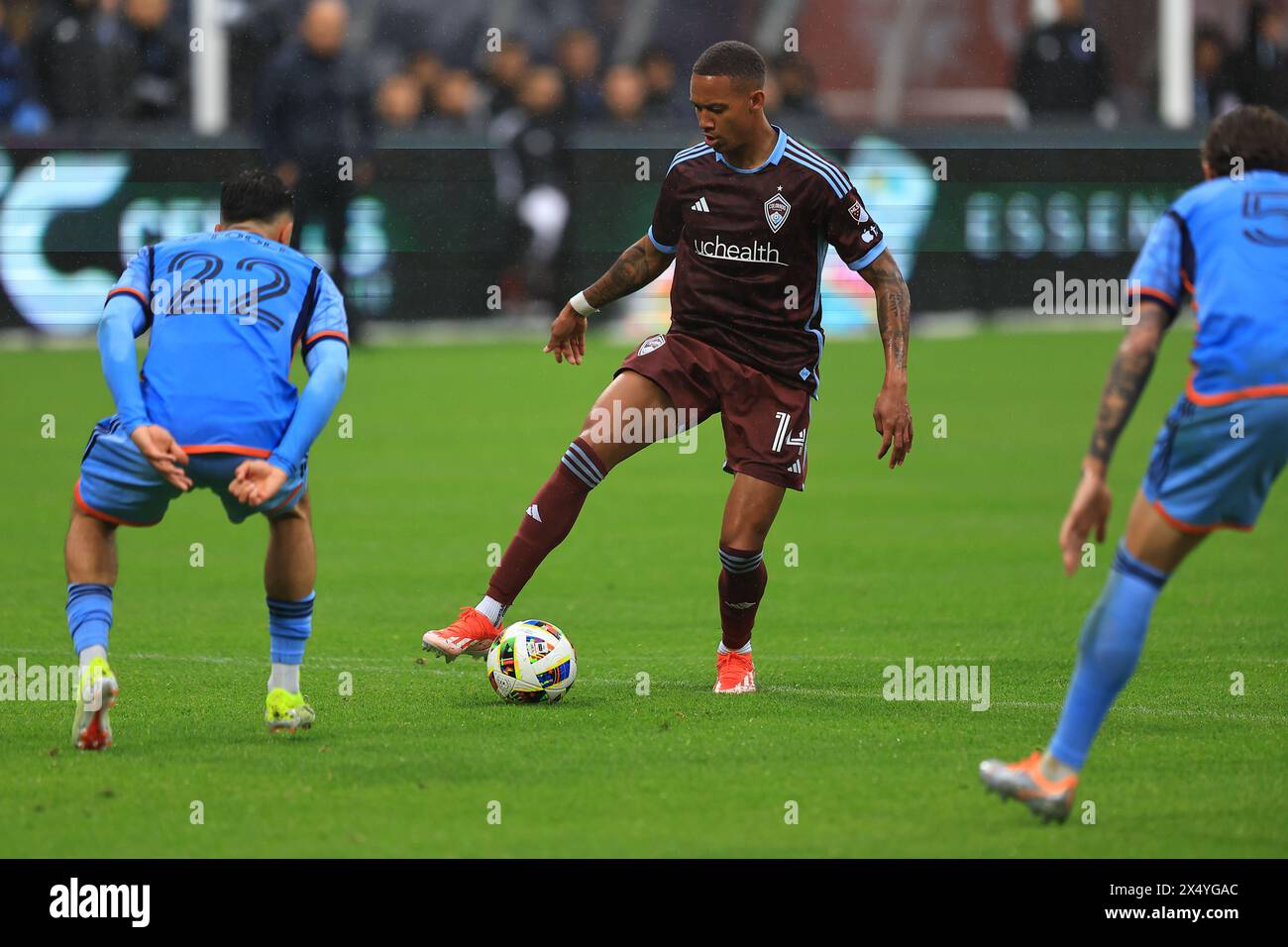 Colorado Rapids FC forward Calvin Harris #14 is approached by defenders ...