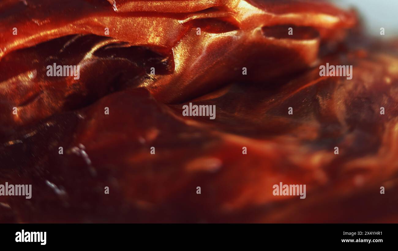 Honey liquid. Amber stone. Defocused golden color sparkling mineral ...