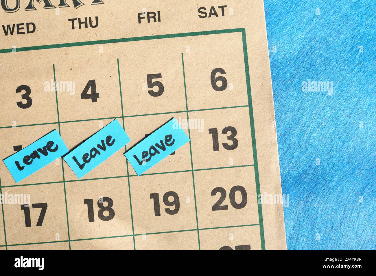 Annual leave from office work concept. Written reminder note on ...