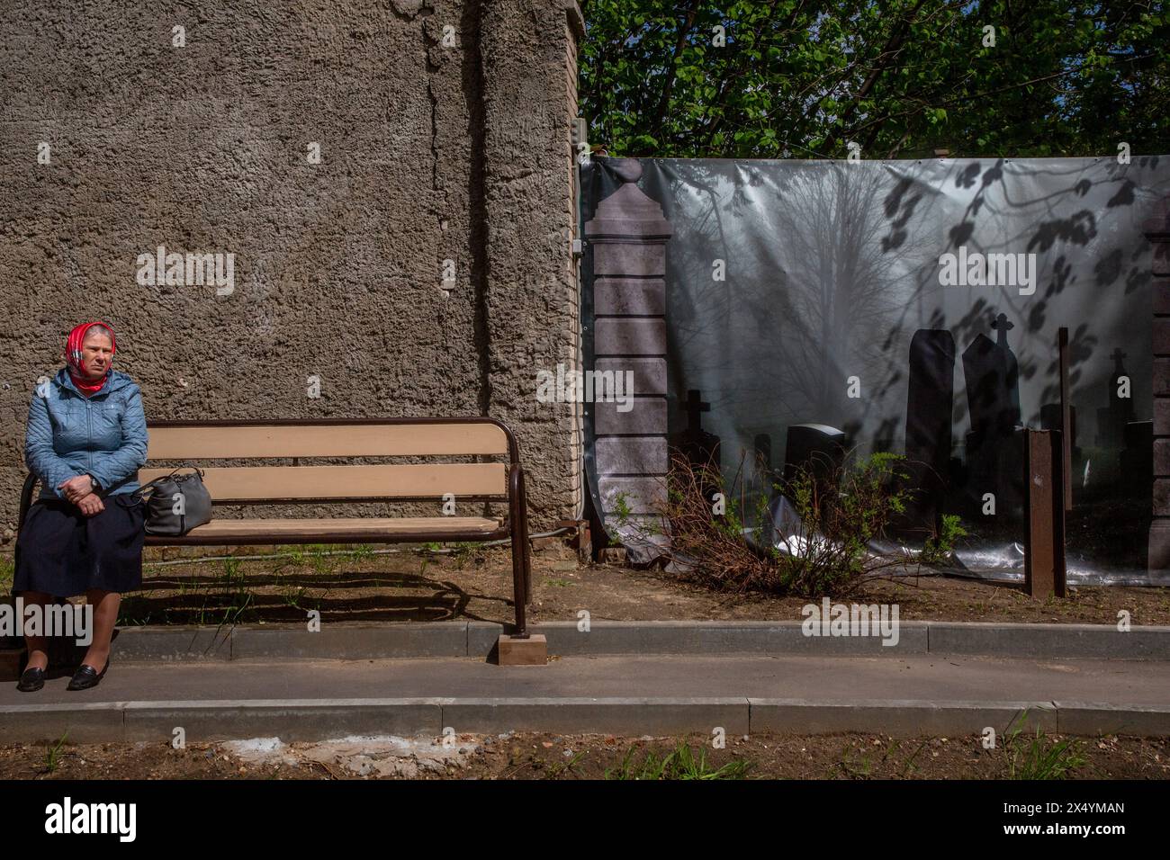Moscow, Russia. 5th May, 2024. A woman seats on a bench at the ...
