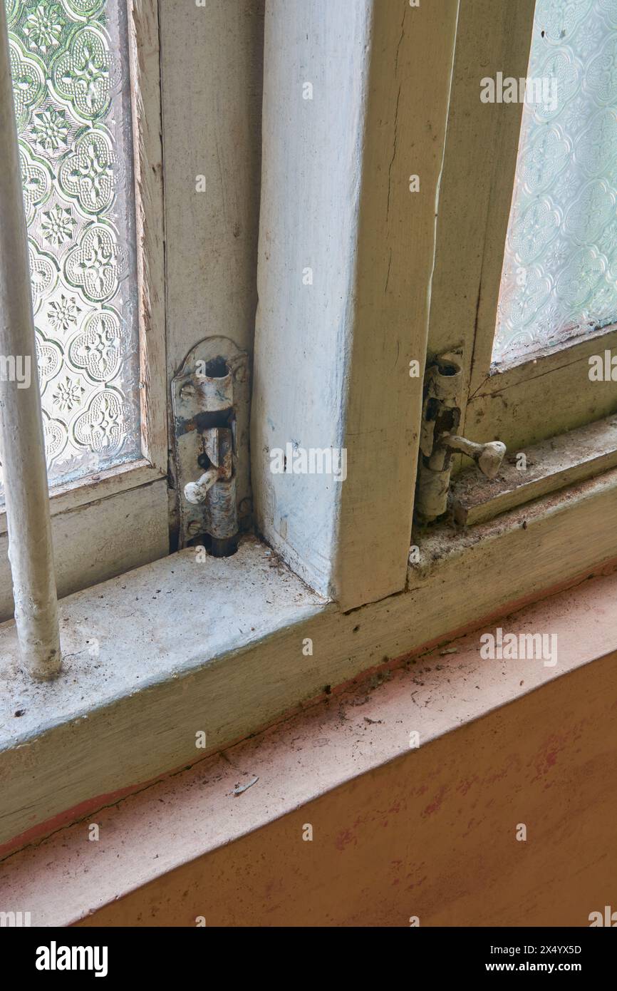 old dirty wooden glass windows with tower bolt hinge and lock installed ...