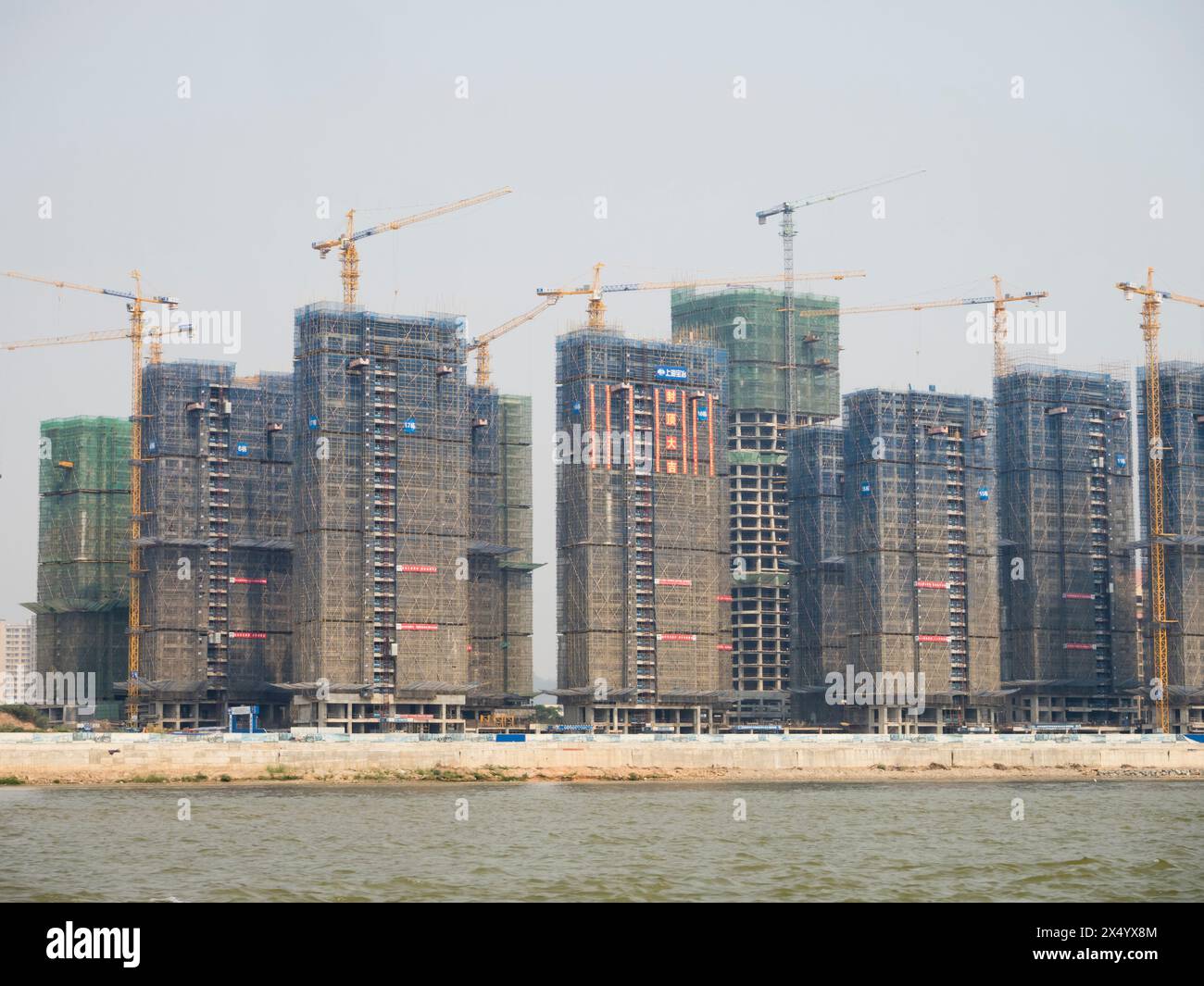 Van Pak Len, Laos - 28 March 2024: Residential hirise buildings under ...