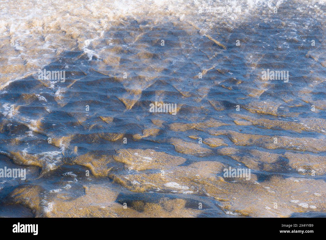 Water flows on sand beach in Three Mile Beach, Santa Cruz, CA, USA ...