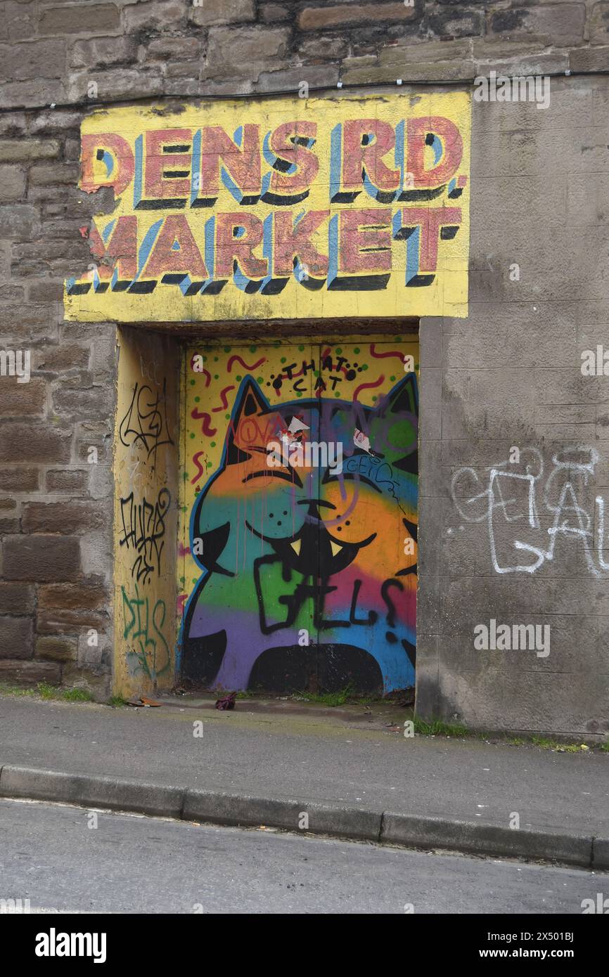 A graffiti-covered entrance to the former Dens Road Market in Dundee ...