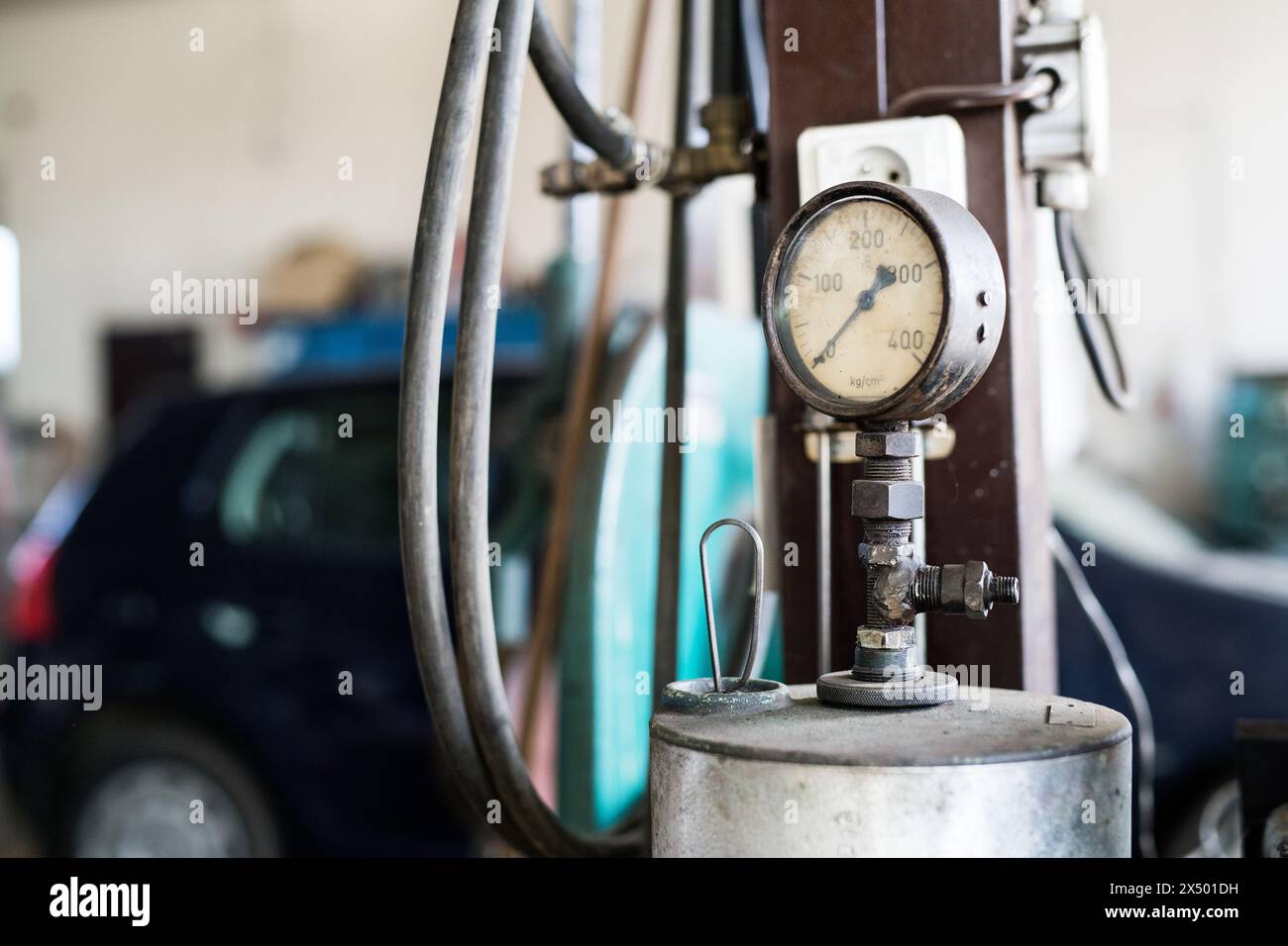 Mechanic in uniform inspecting truck hi-res stock photography and ...