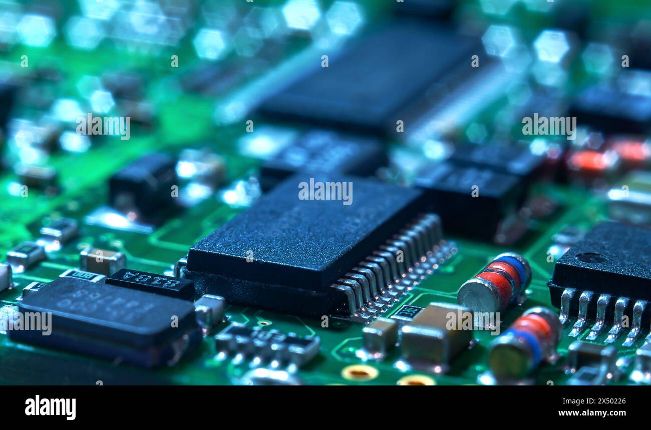 Closeup of Printed Circuit Board with processor, integrated circuits ...
