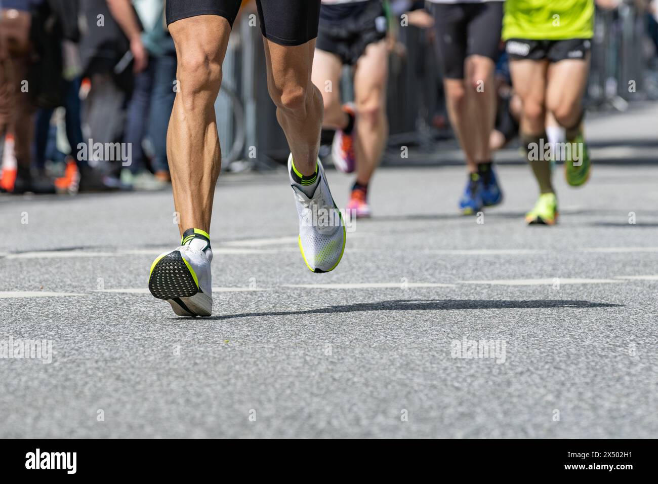 legs of a runner at the hamburg marathon Stock Photo - Alamy