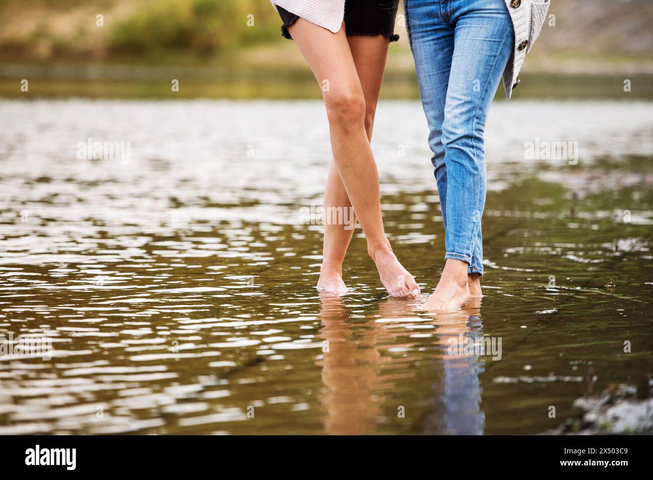 Adult daughter spending time with her mother. Mom and daughter outdoors ...