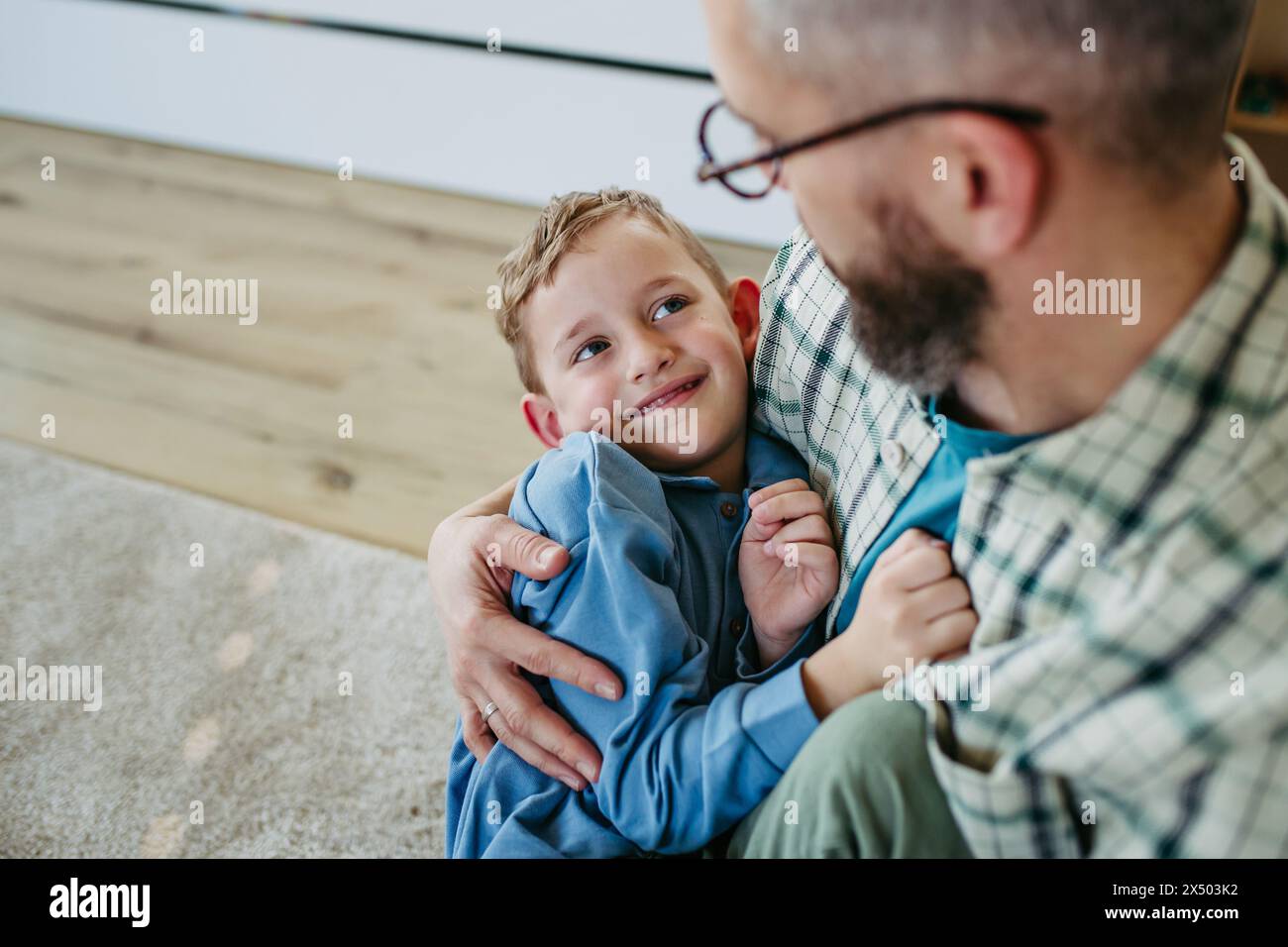 Dad hugging little son, true love. Happy Fathers day concept Stock ...