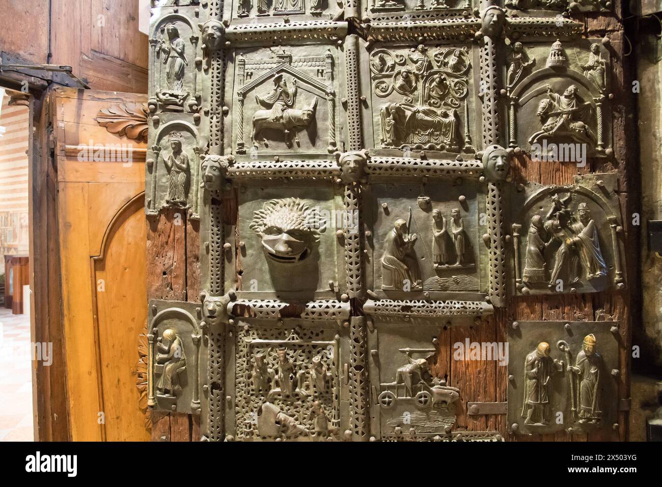 Romanesque bronze doors with the scenes of the Old Testament and the ...