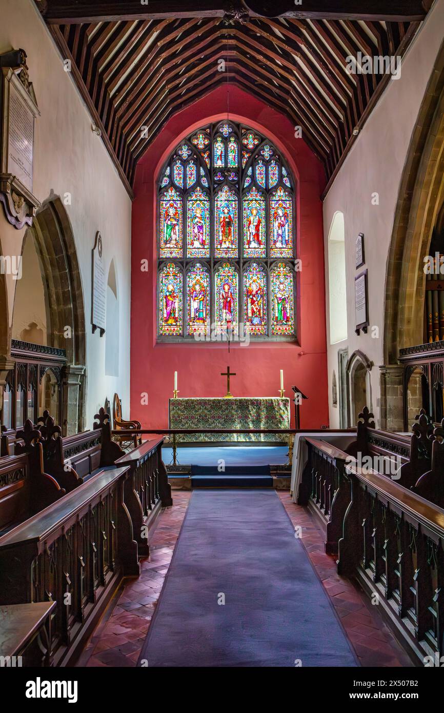 The interior and stained glass windows of St. Mildred's Church ...