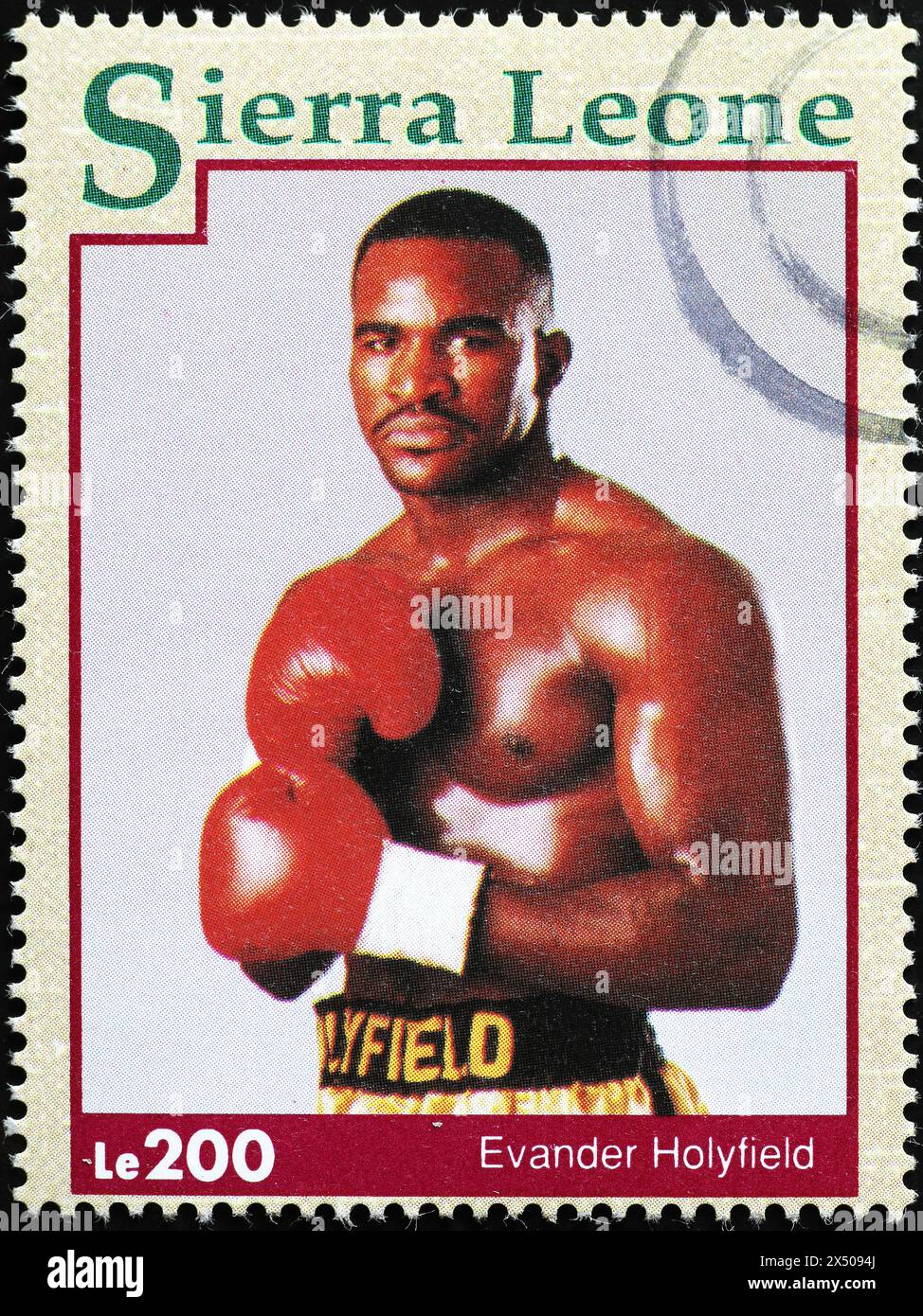 Boxer Evander Holyfield celebrated on postage stamp Stock Photo - Alamy