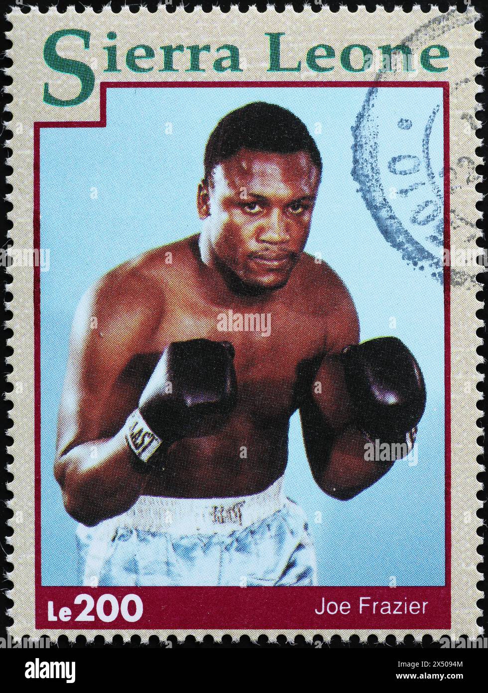 Boxer Joe Frazier celebrated on postage stamp Stock Photo - Alamy