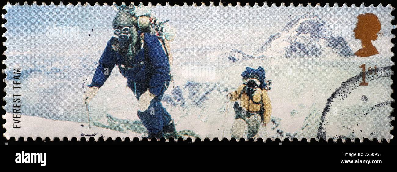 Climbing Everest on british postage stamp Stock Photo - Alamy