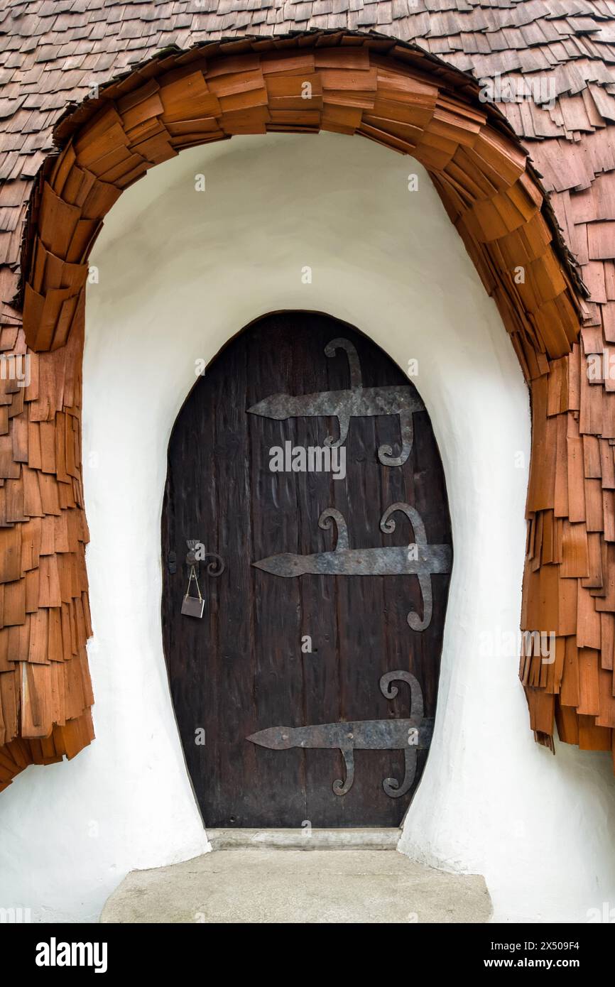 Enchanted Entryway: Mystical Arched Door in old Cottage. Charming ...