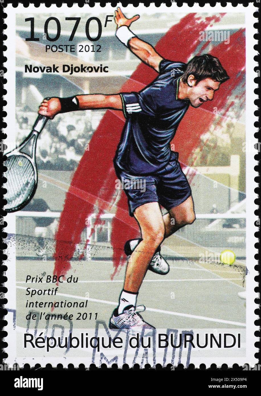 Tennis player Novak Djokovic in action on postage stamp Stock Photo - Alamy