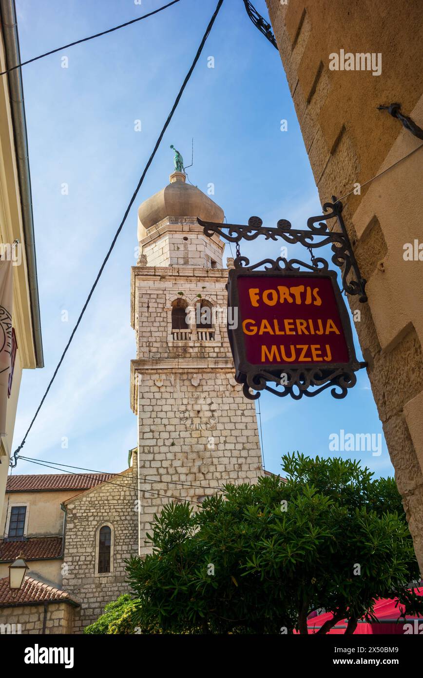 krk, croatia, 1 may 2024, street in the old town, church, tower, museum ...