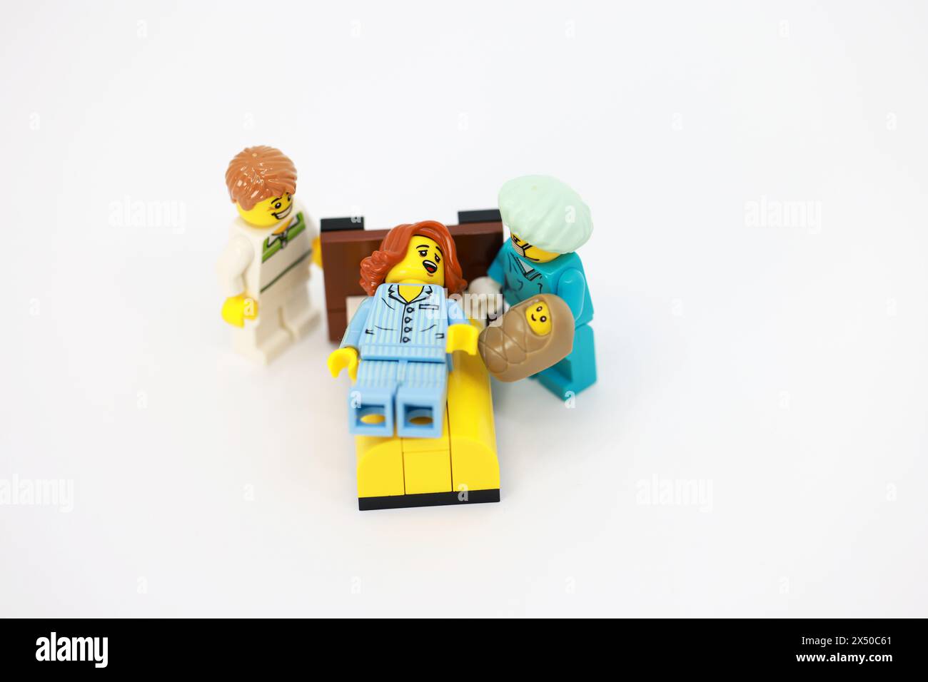 nurse give a new born baby to the mother Stock Photo - Alamy