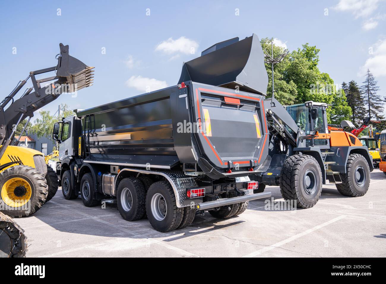 Heavy construction machines during a work Stock Photo - Alamy