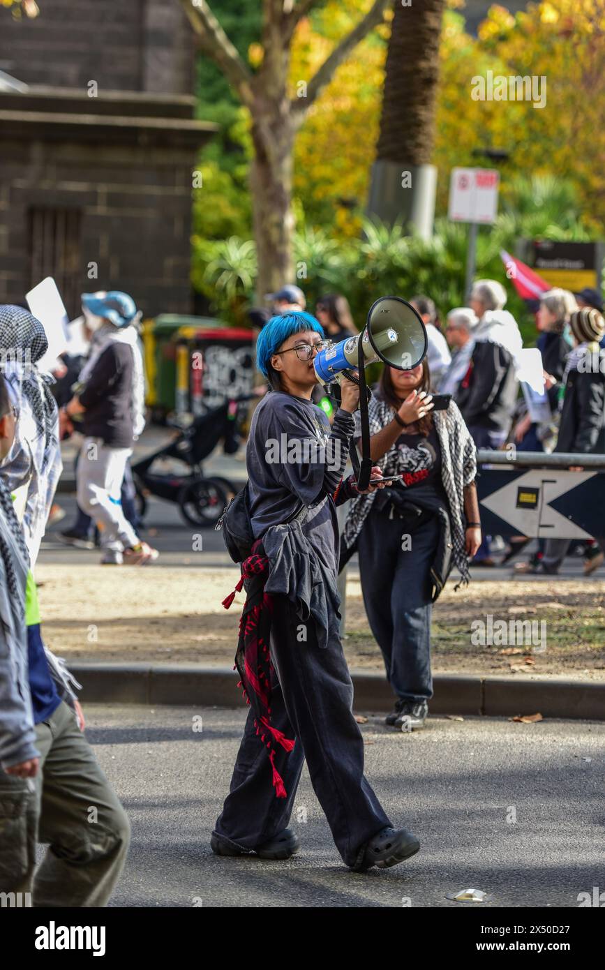 Philippines Bayan Party member speaks on a megaphone during the May Day ...
