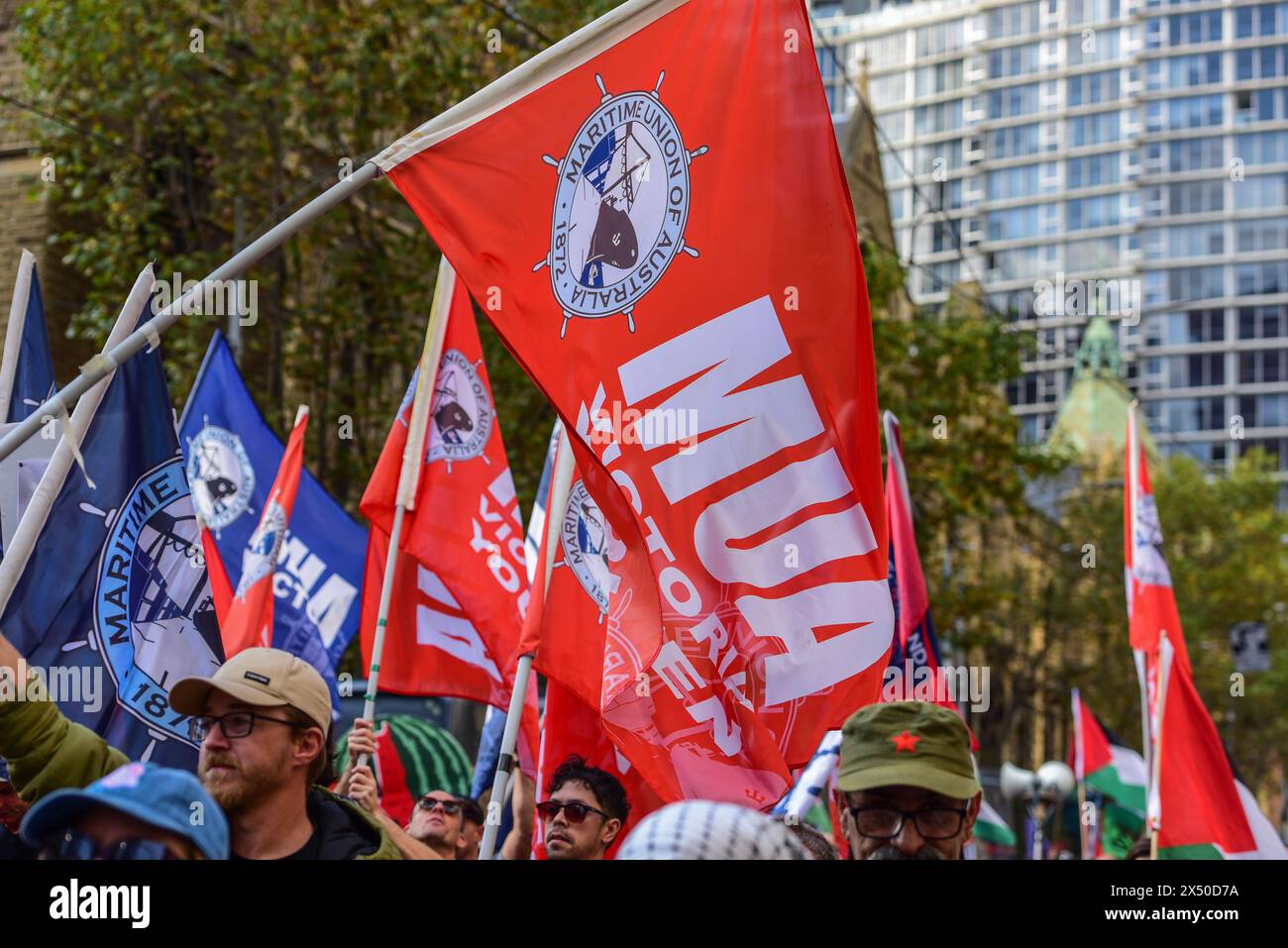 Union flags, including MUA (Maritime Union of Australia) flag, are seen ...
