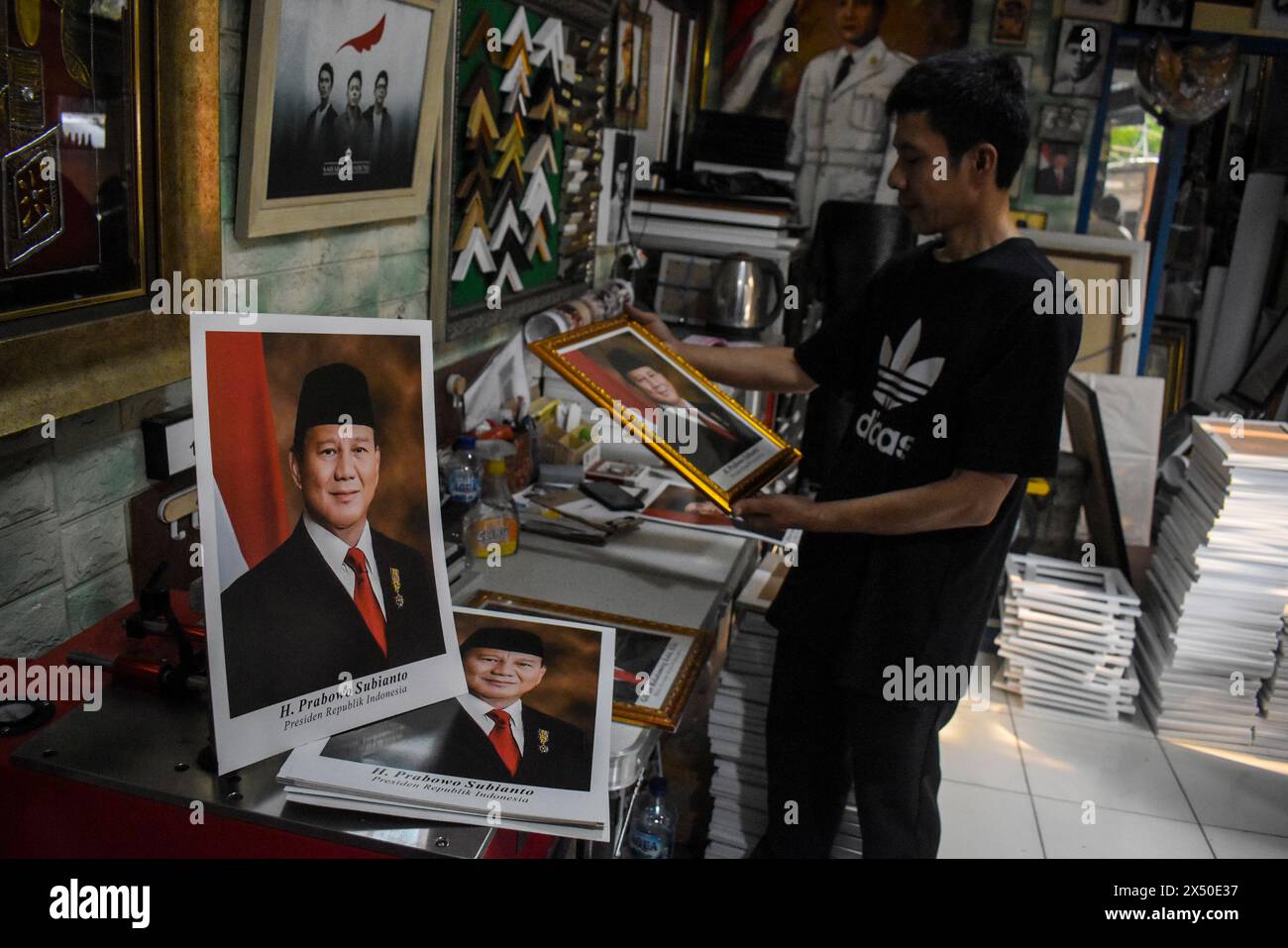 Bandung, West Java, Indonesia. 6th May, 2024. A vendor sells framed ...