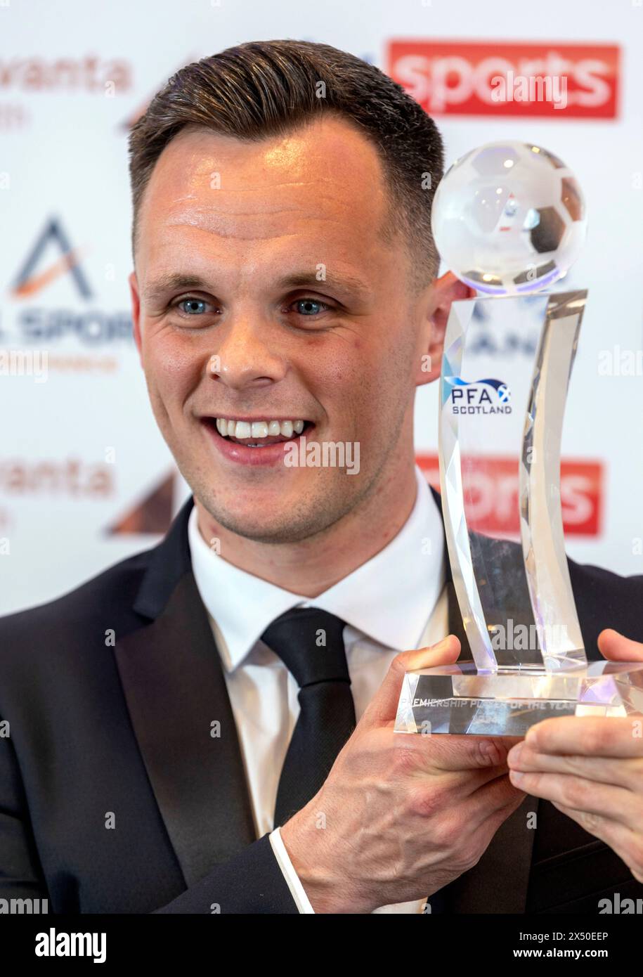 Heart of Midlothian's Lawrence Shankland with the award for Player of ...
