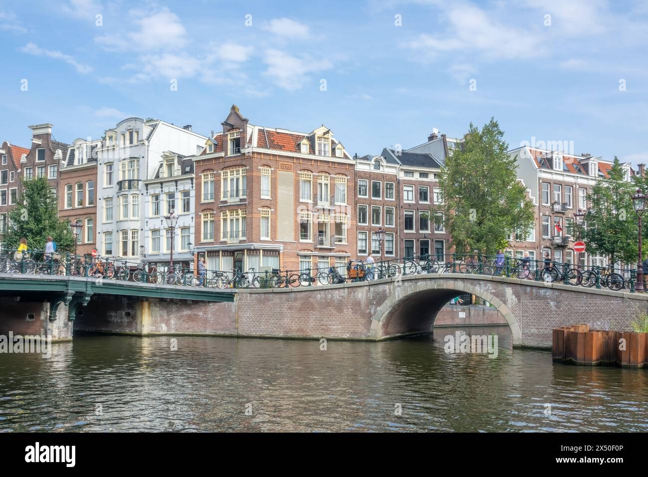 Netherlands. Summer day. Typical Dutch houses on the waterfront of ...