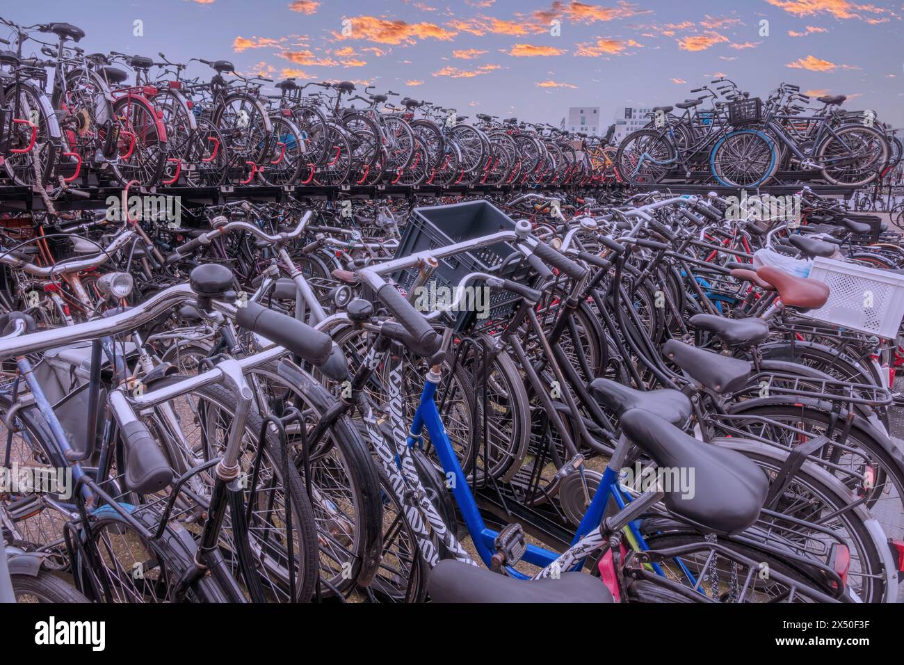 Netherlands. Lots of bicycles in a two-level bicycle parking area near ...