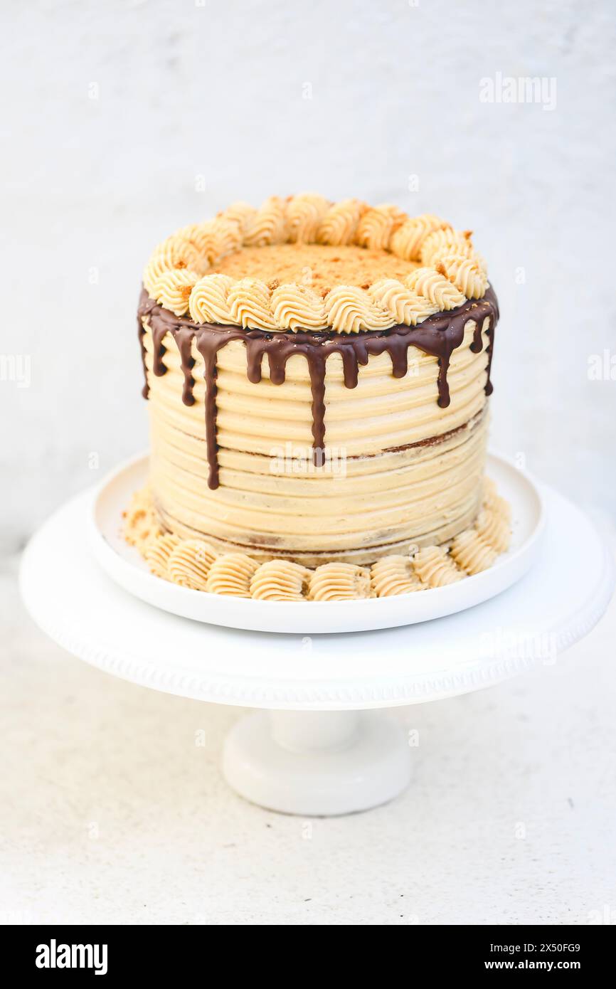 Close-up of a chocolate and cookie sponge layer cake with buttercream ...