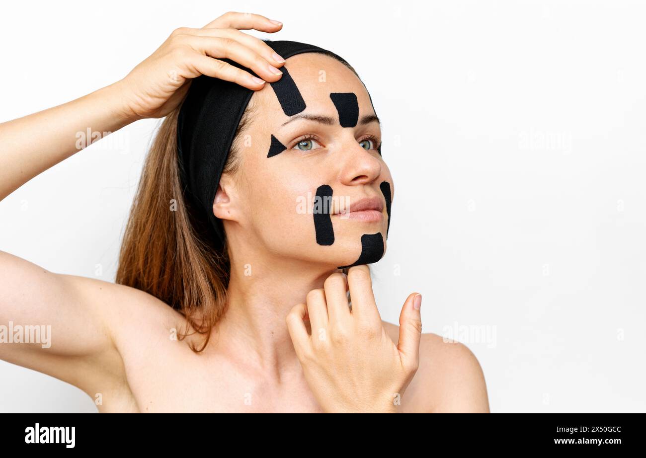 Facial rejuvenation and anti-aging alternative therapy. Brunette woman ...