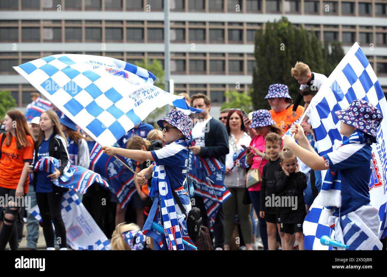 Ipswich Town fans ahead of an open-top bus parade in Ipswich to ...