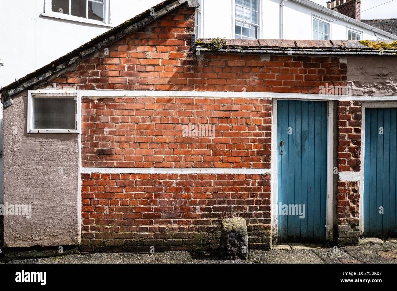 TRURO CITY CORNWALL RED BRICK BUILDING WITH BLUE DOOR Stock Photo - Alamy